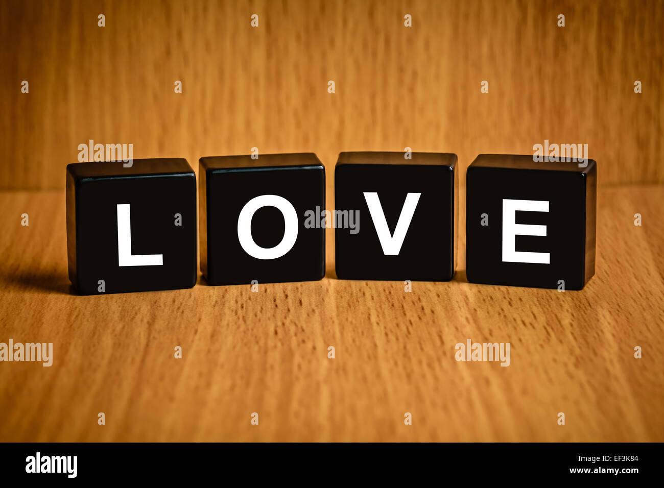 love text on black block Stock Photo - Alamy