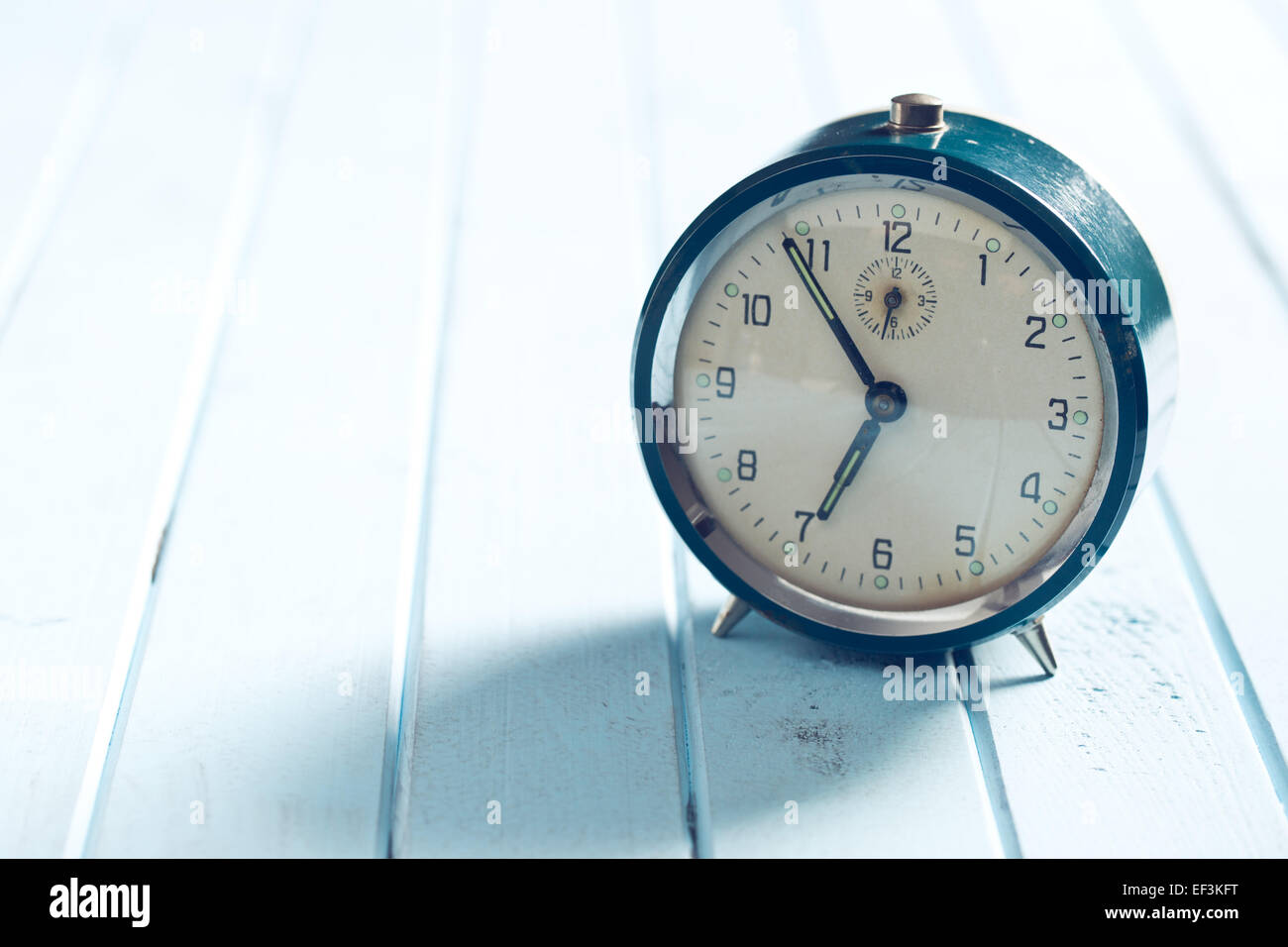 the analog alarm clock on wooden table Stock Photo - Alamy the analog alarm clock on wooden table Stock Photo - Alamy