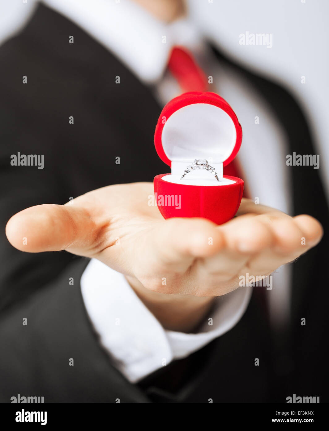 man with wedding ring and gift box Stock Photo - Alamy