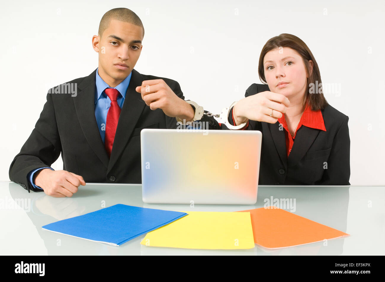Female handcuffed hi-res stock photography and images - Alamy