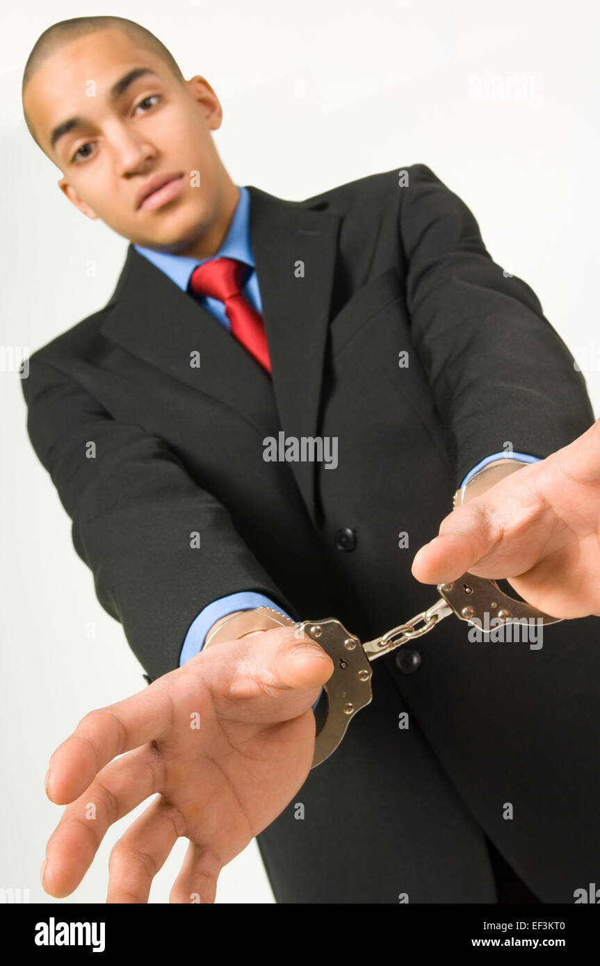 Handcuffed prisoners hi-res stock photography and images - Alamy