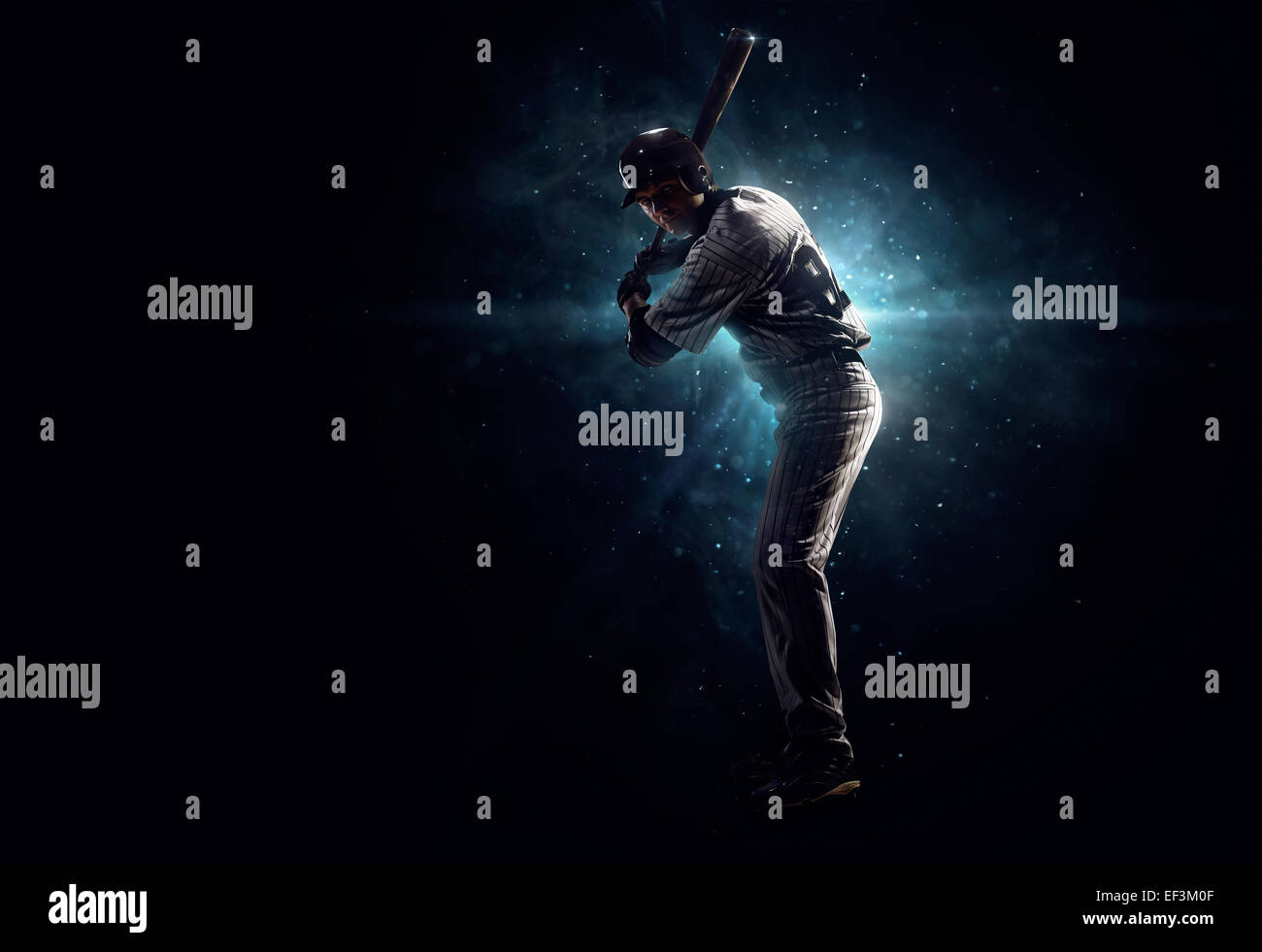 Professional baseball player is tanding in the spotlight Stock Photo ...
