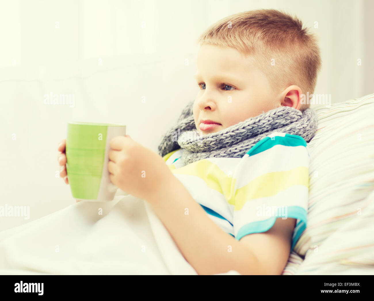 ill boy with flu at home Stock Photo - Alamy