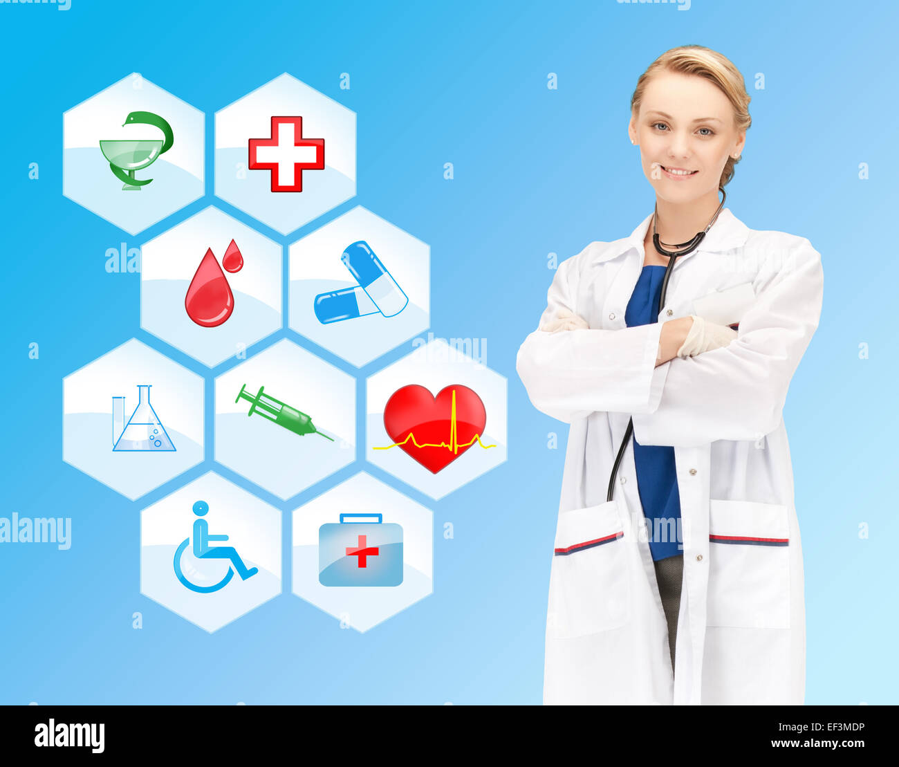 smiling doctor over medical icons blue background Stock Photo - Alamy