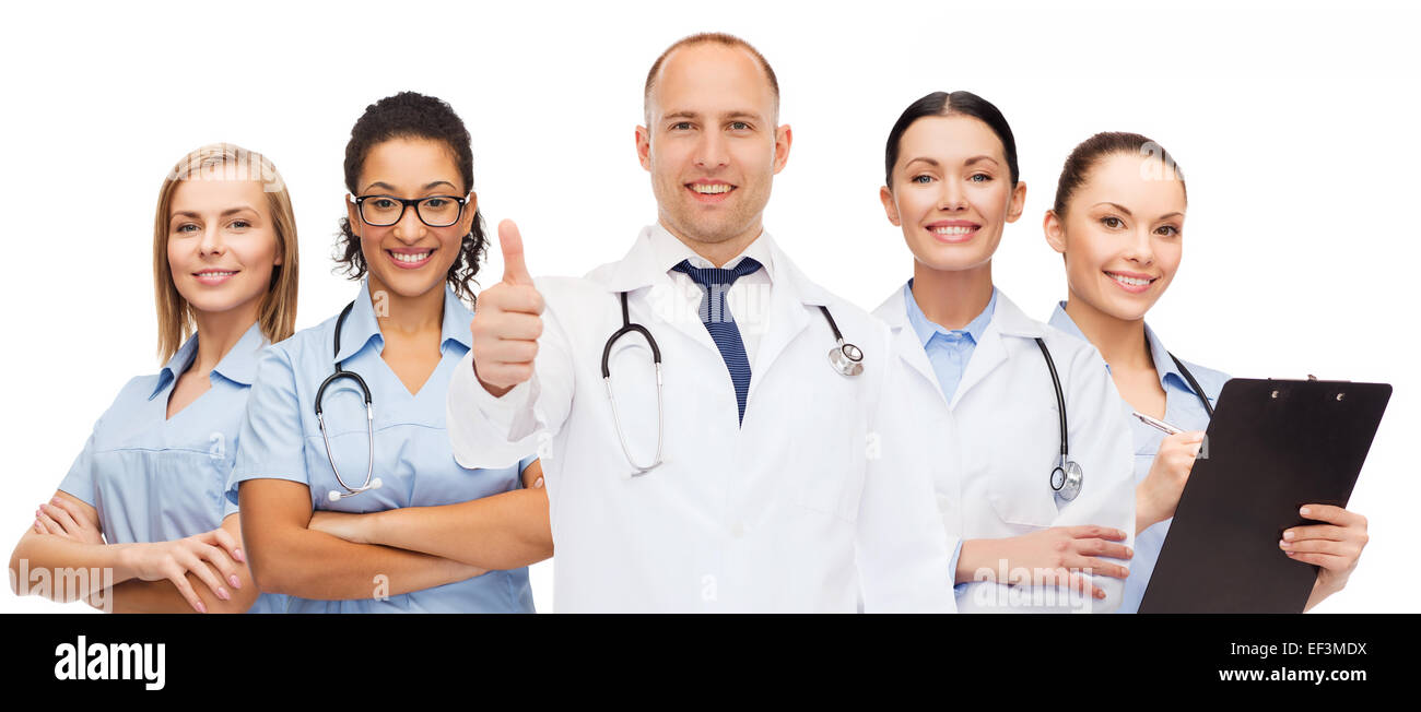 group of smiling doctors with showing thumbs up Stock Photo - Alamy