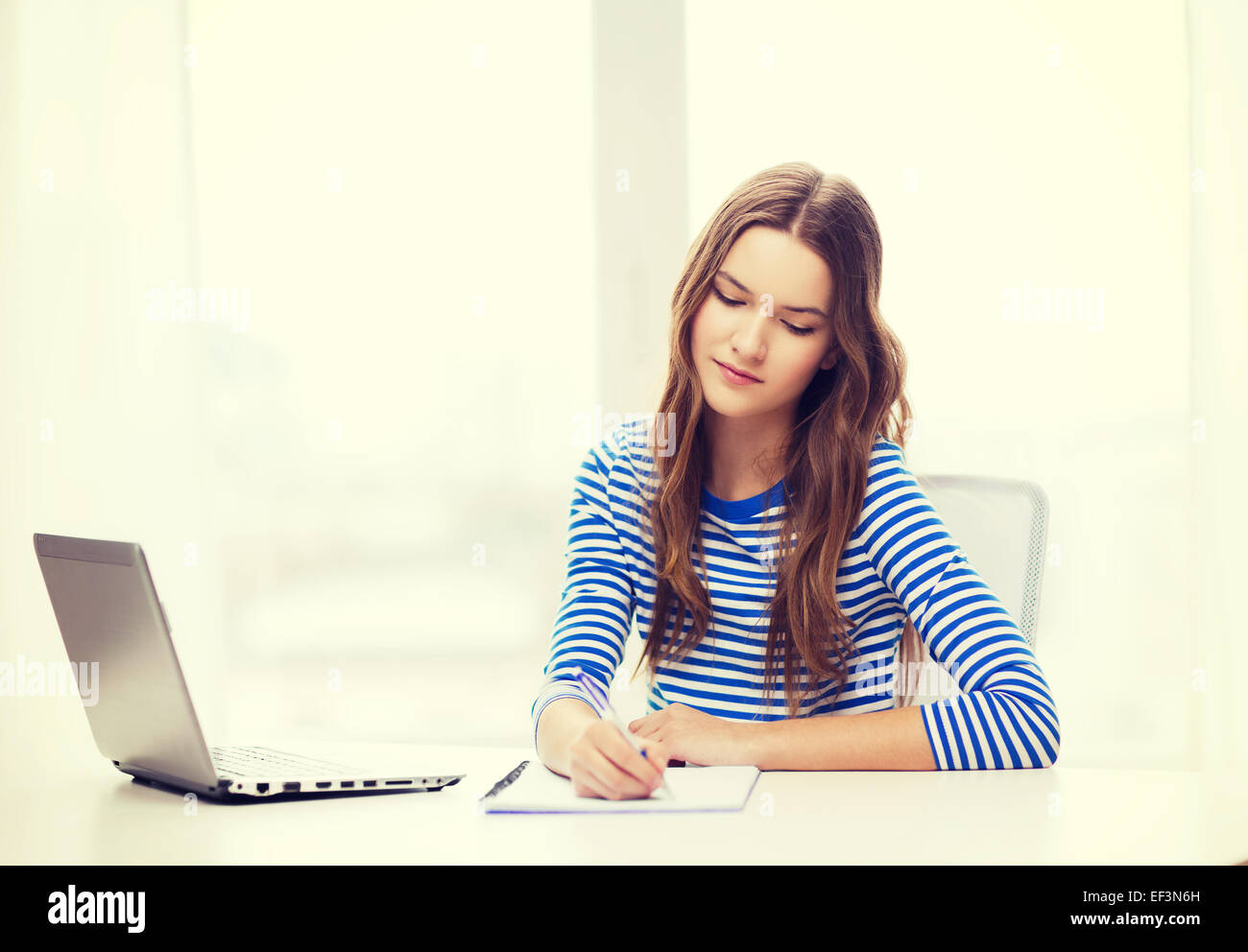 teenage girl laptop computer and notebook Stock Photo - Alamy