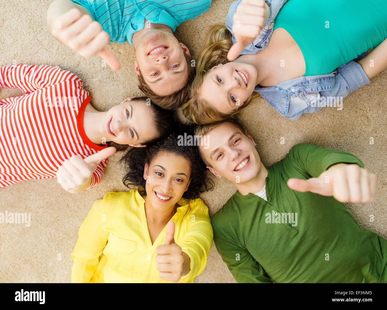 Group friends lying down showing hi-res stock photography and images ...