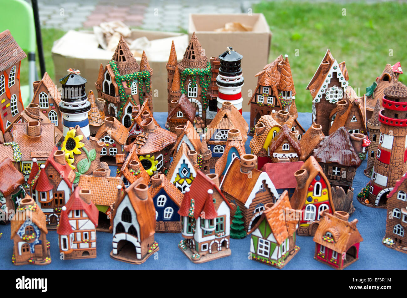 Many ceramic toys for children. Souvenirs. Building houses and ...