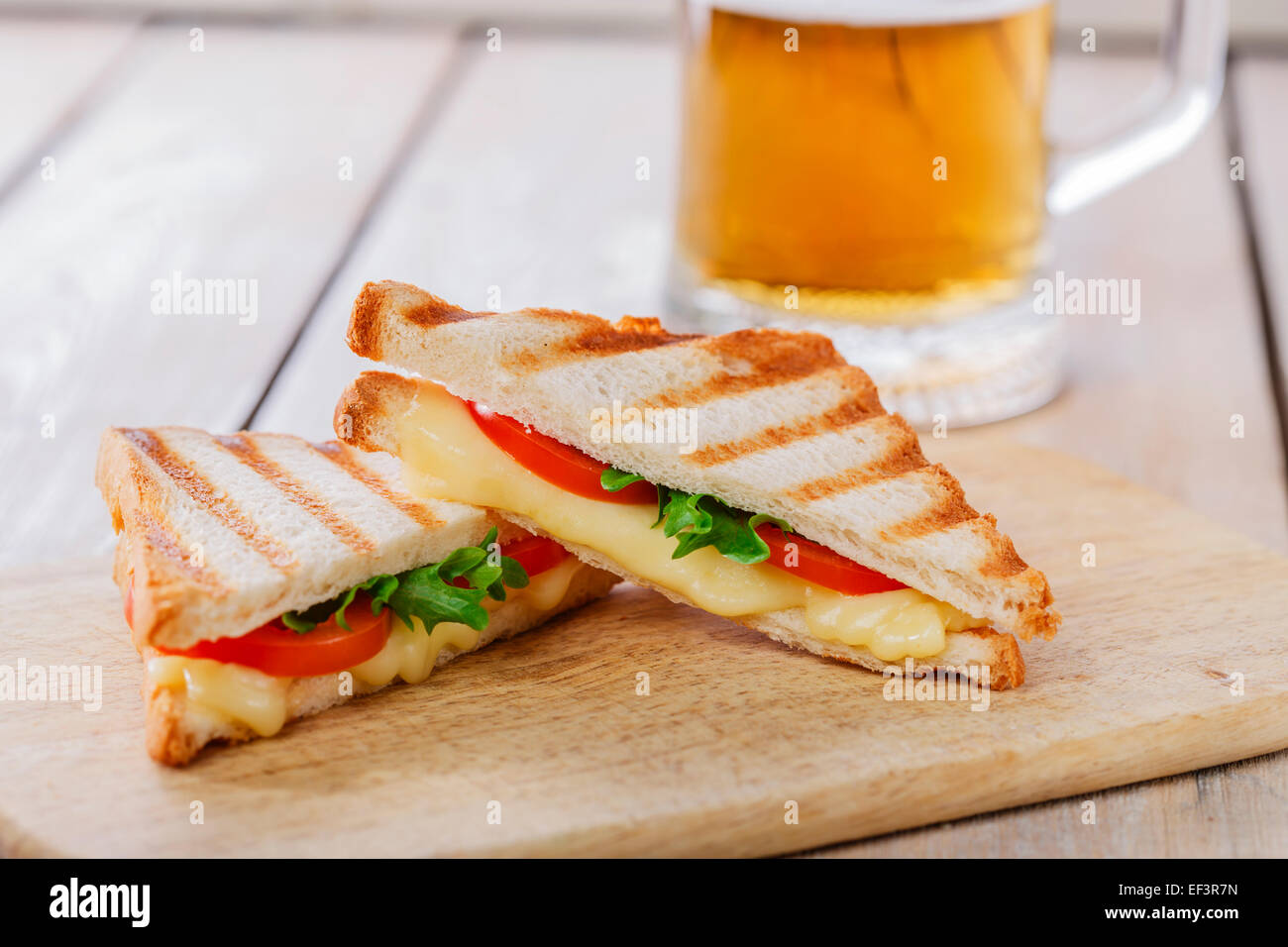 sandwich toast grilled with cheese and tomatoes Stock Photo - Alamy