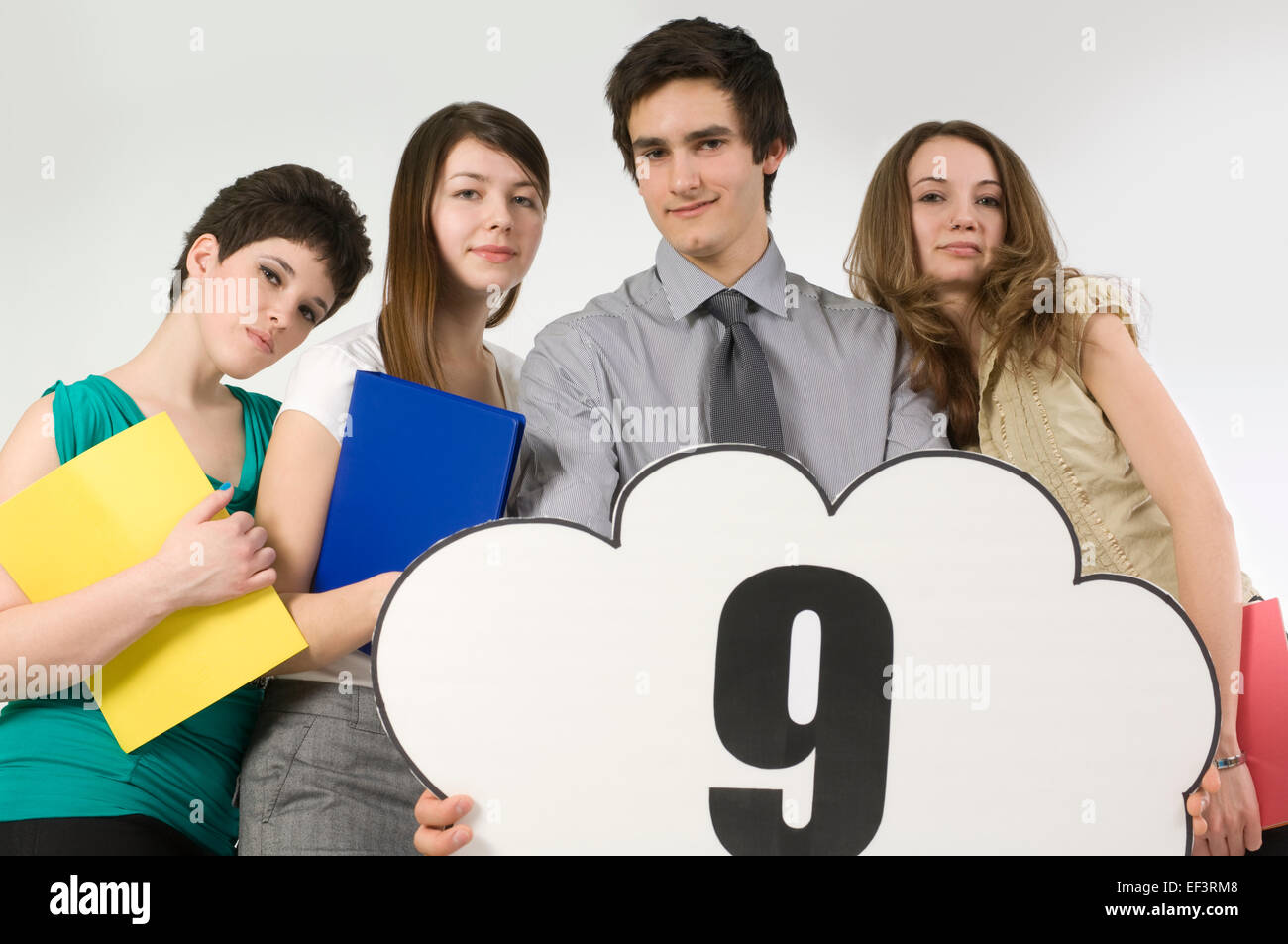 Group of people holding a cloud poster with the number 9 on it Stock ...