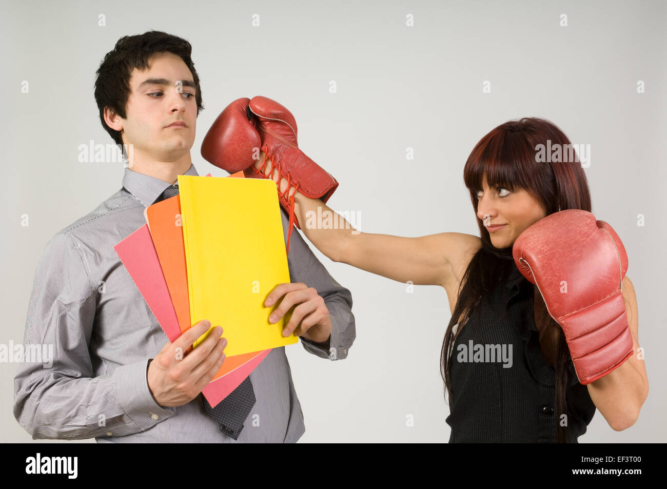 Woman fighting paperwork hi-res stock photography and images - Alamy