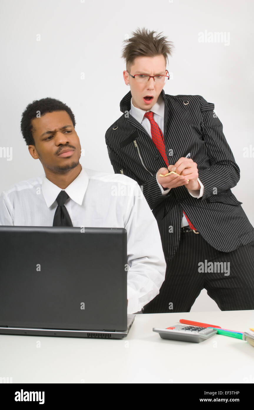 Man reading information from someone else's computer Stock Photo - Alamy