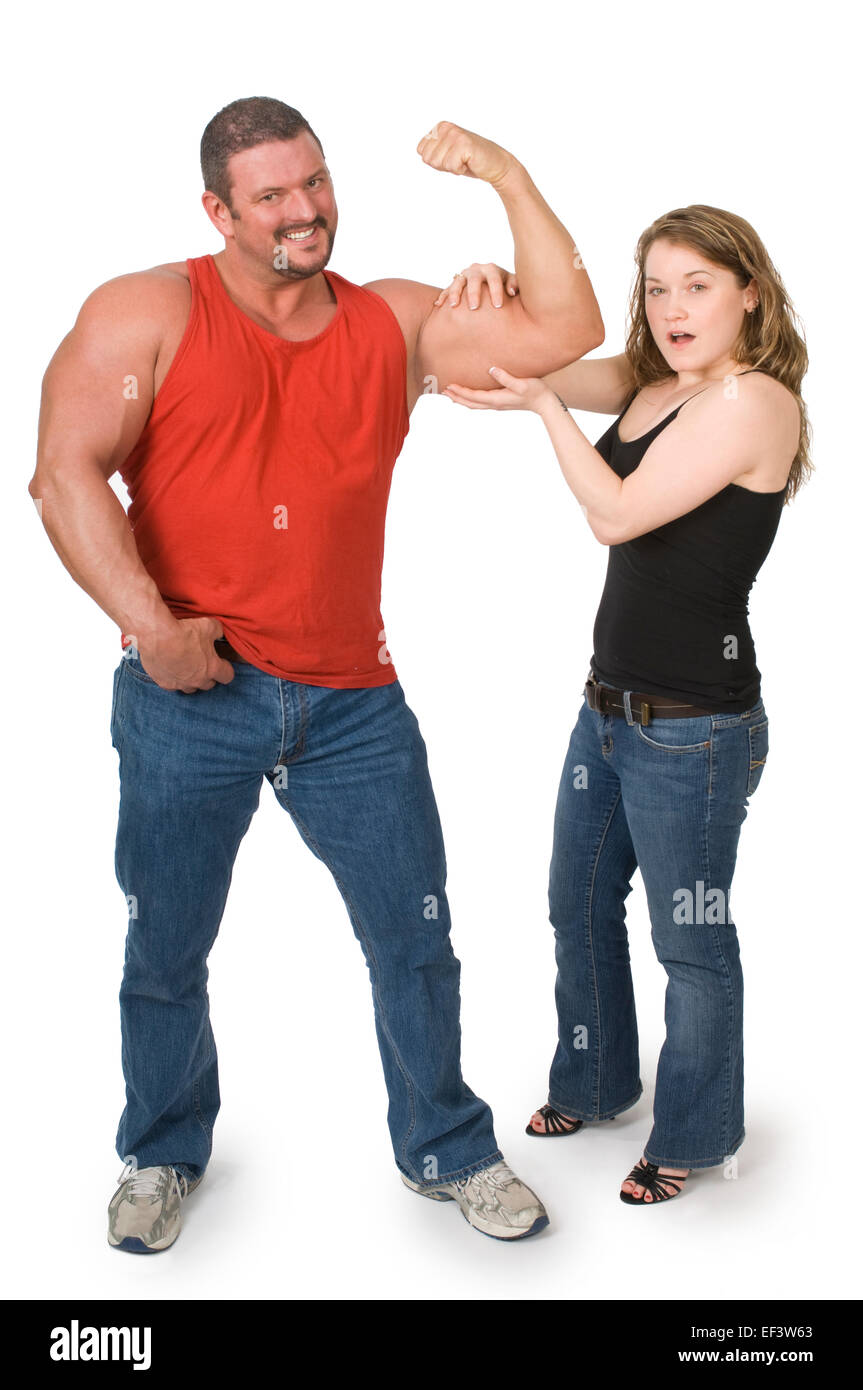 Strong man showing muscles Cut Out Stock Images & Pictures - Alamy