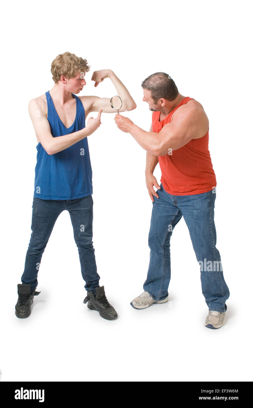 Young man checking hair Cut Out Stock Images & Pictures - Alamy