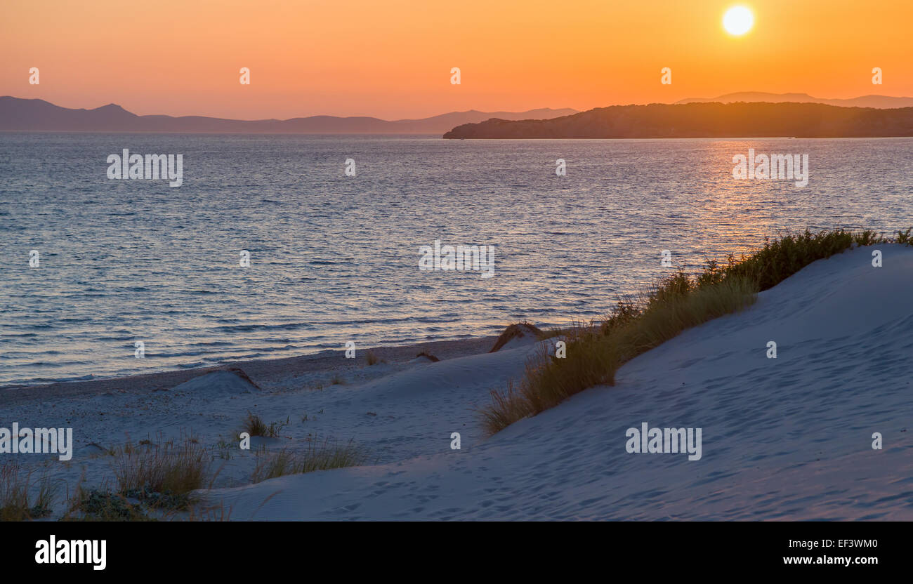 Sunset in sand dunes Stock Photo - Alamy