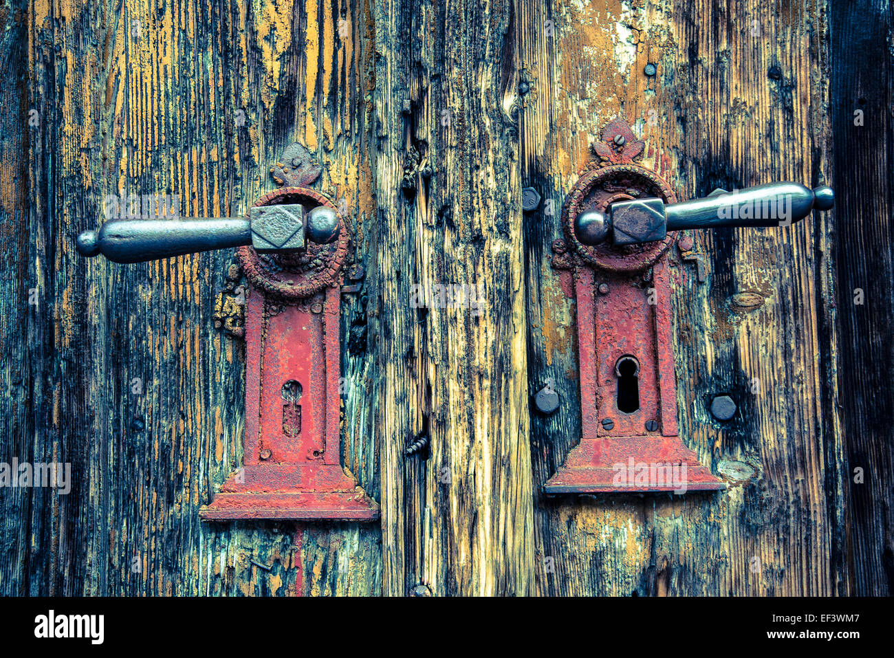 Red door handles Stock Photo - Alamy