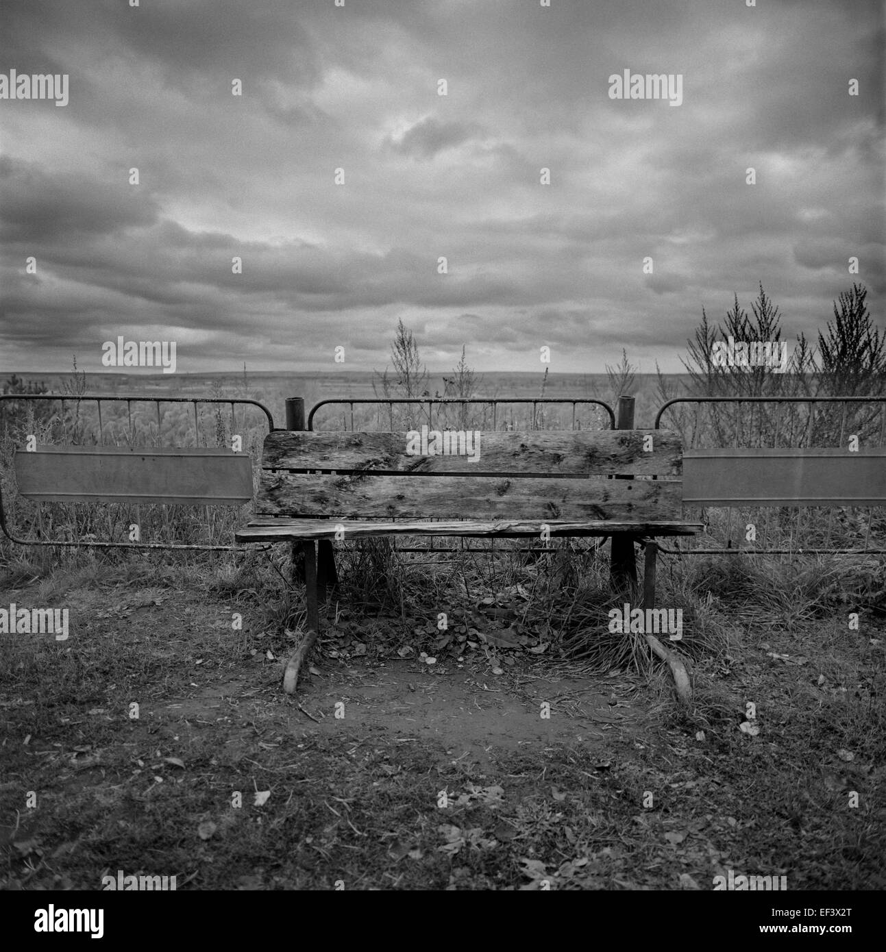 An old bench with a distant view Stock Photo - Alamy