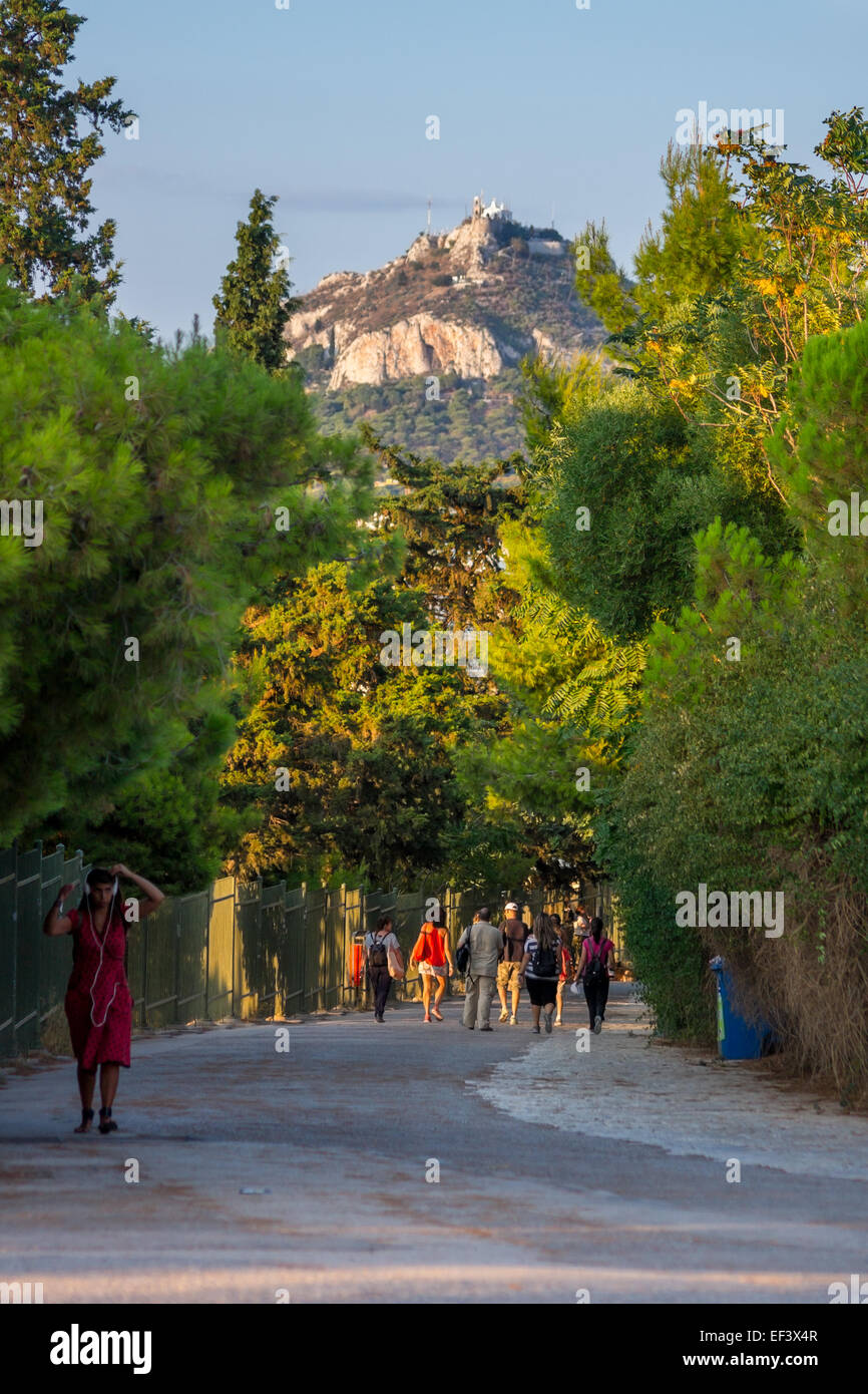 Holiday makers walking around the Acropolis and Parthenon ancient site ...