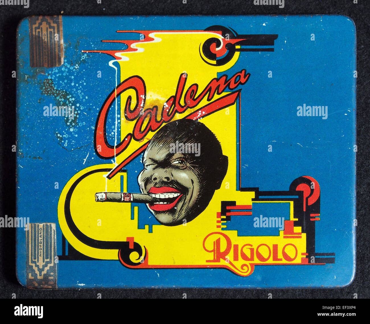 The Cadena Rigolo cigar tin, a vintage collectible, displays the ...