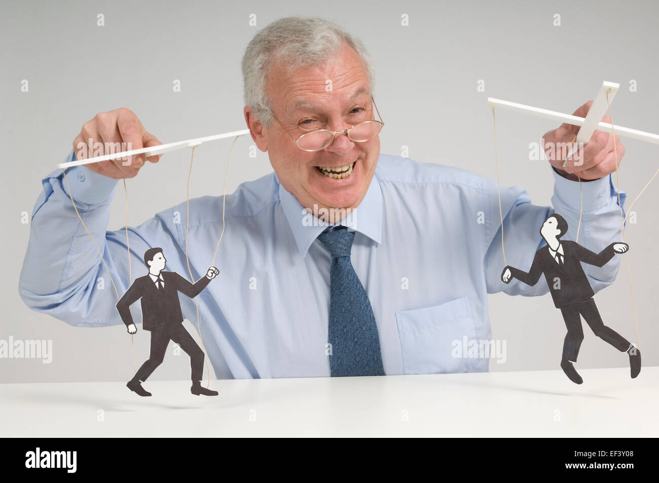 Man playing with puppets Stock Photo - Alamy