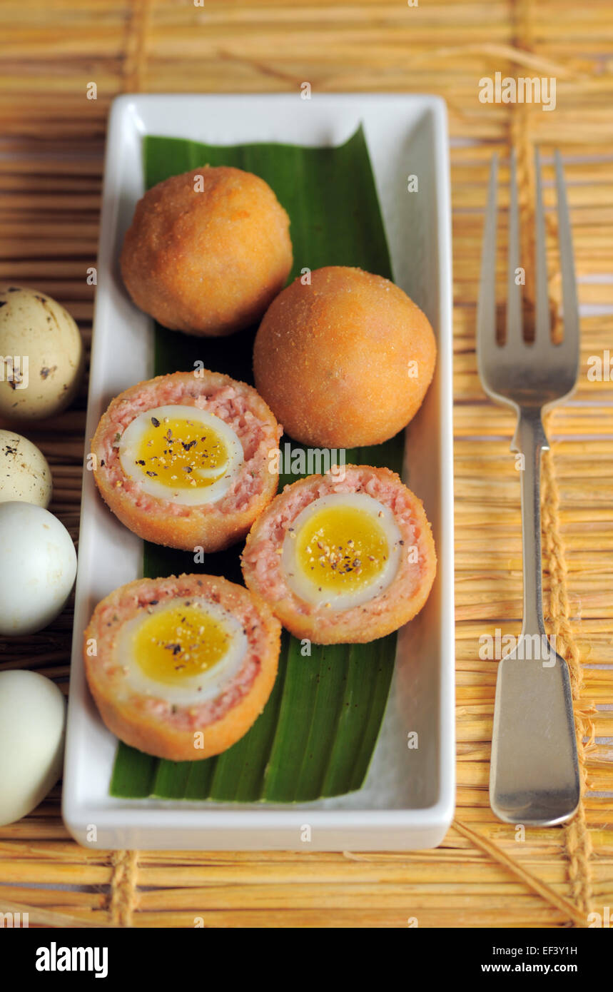 Scotch eggs make with quails eggs. a UK food foods delicacy delicacies ...