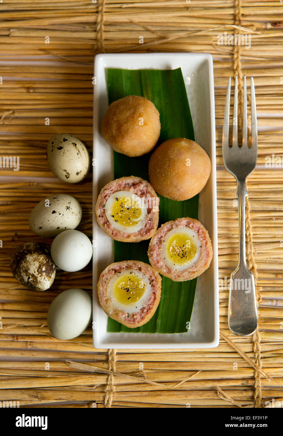Scotch eggs make with quails eggs. a UK food foods delicacy delicacies ...