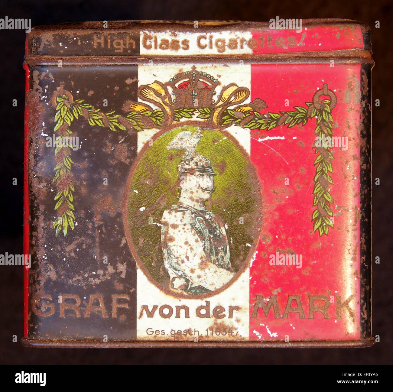 A photo of the front of a vintage Graf von der Mark cigarette tin ...