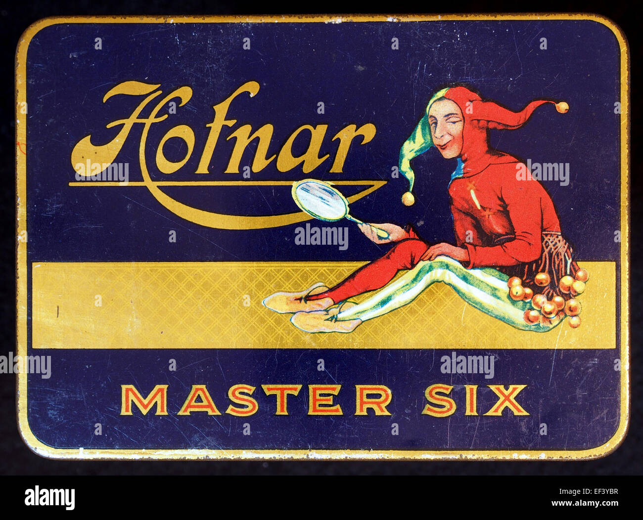 A vintage Hofnar Master Six cigar tin, featuring an elegant design ...
