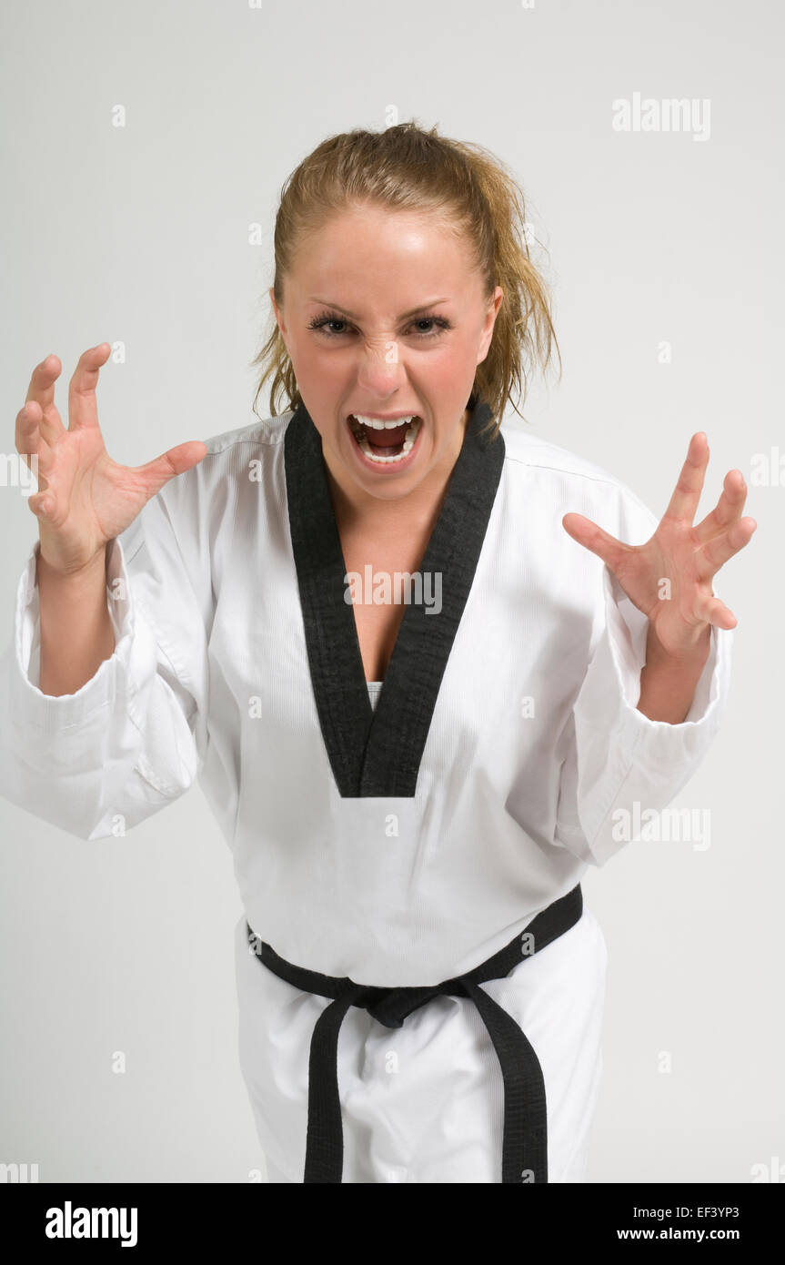Woman wearing karate uniform Stock Photo - Alamy