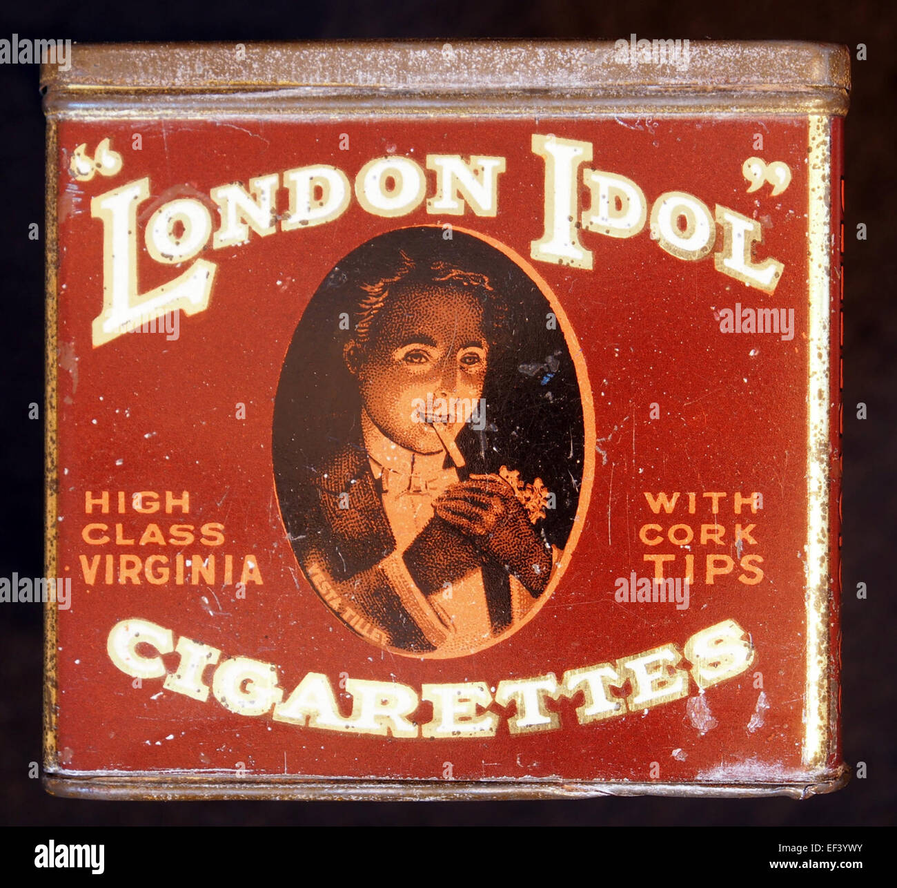 This image features the front of a vintage London Idol cigarettes tin ...