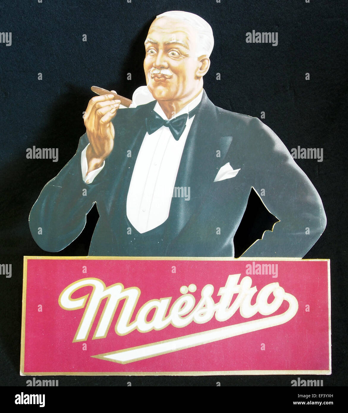 A MaC3ABstro cardboard counter display advertisement is shown ...