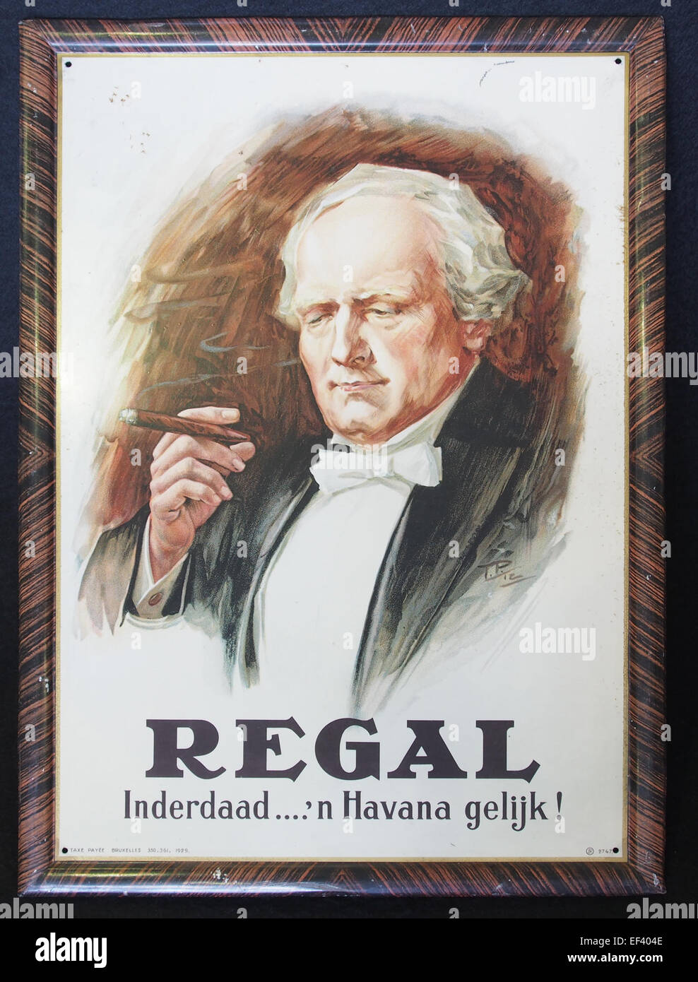 The Regal cigar advertisement features a vintage design, showcasing ...