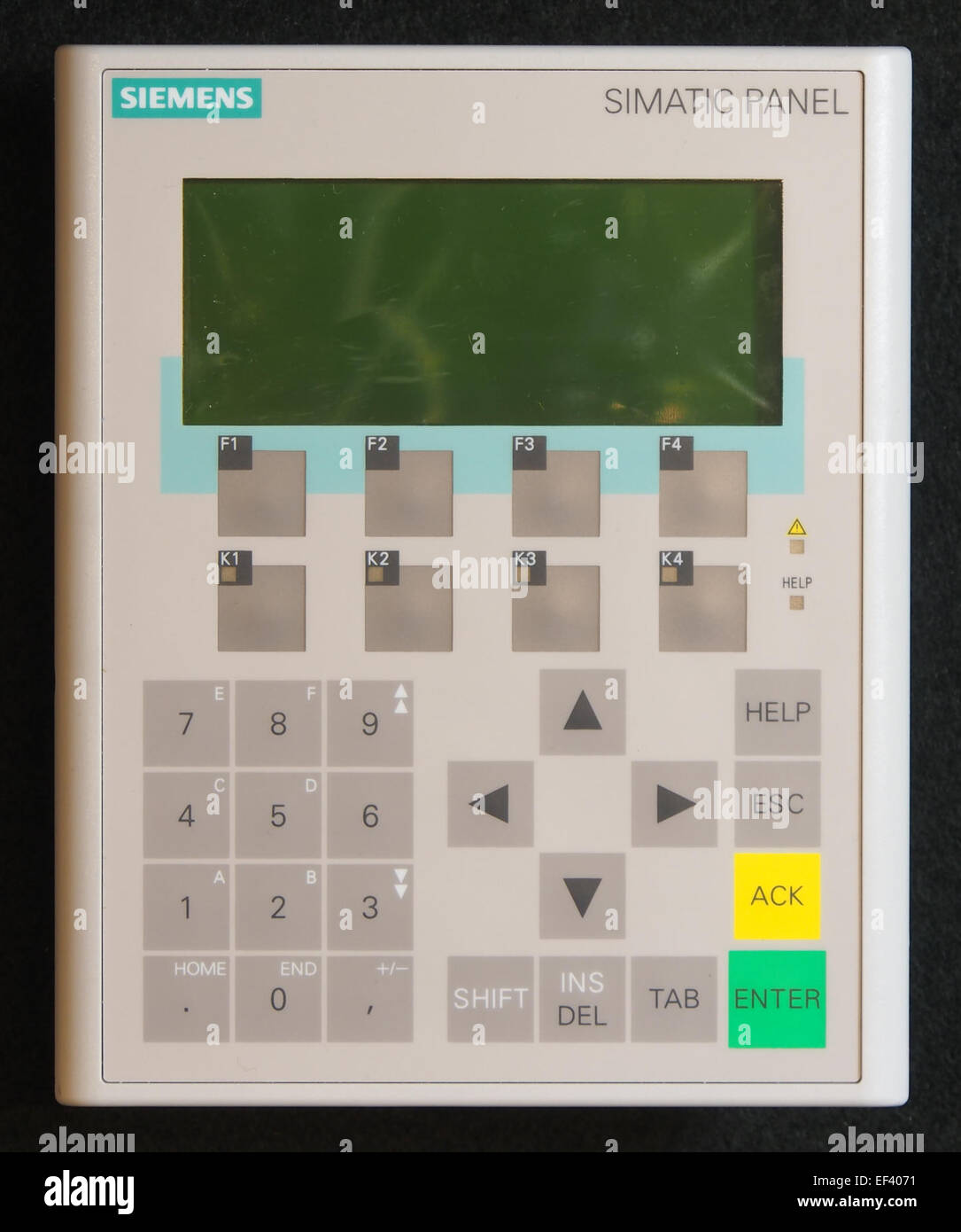 This image features the Siemens OP77B operator panel, which is commonly ...