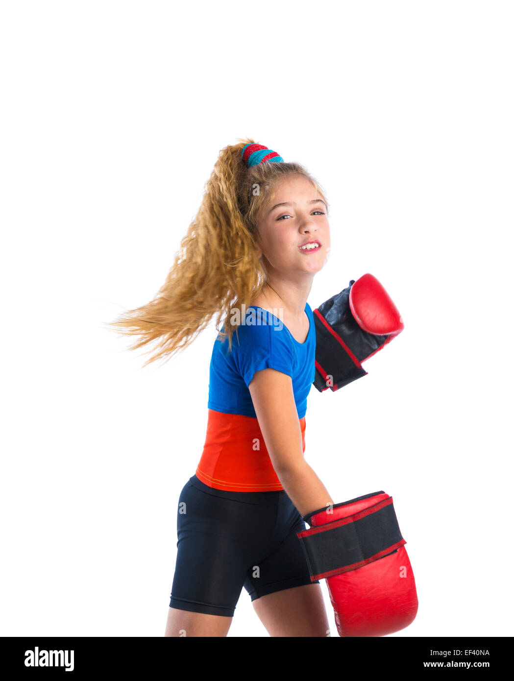boxer kid blond girl with funny boxing gloves kidding aggressive ...