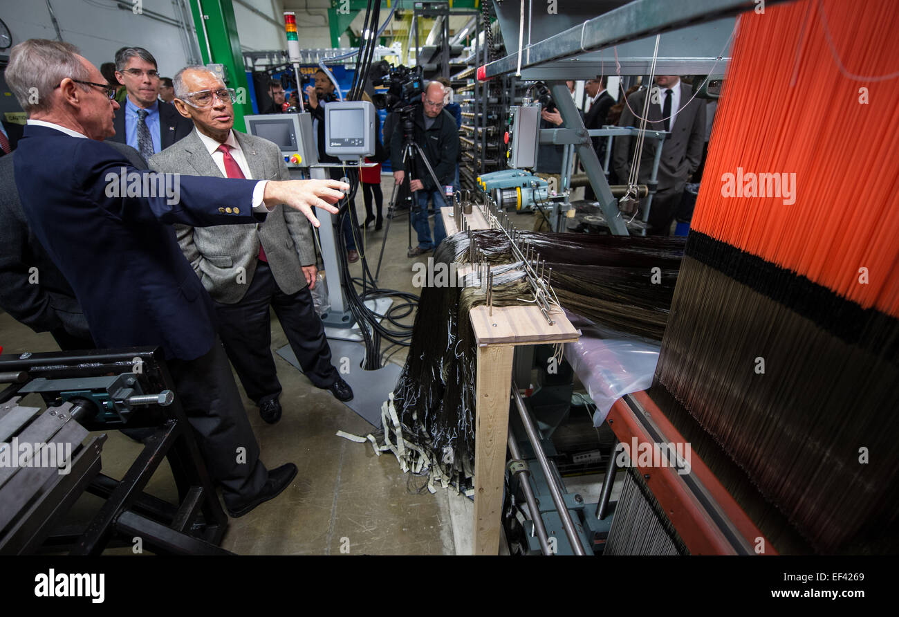 Bally Ribbon Mills President Ray Harries demonstrates the carbon fiber ...
