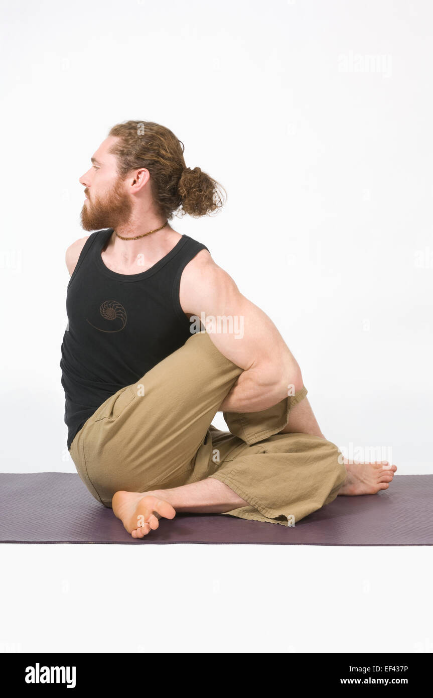 Man doing yoga Stock Photo - Alamy