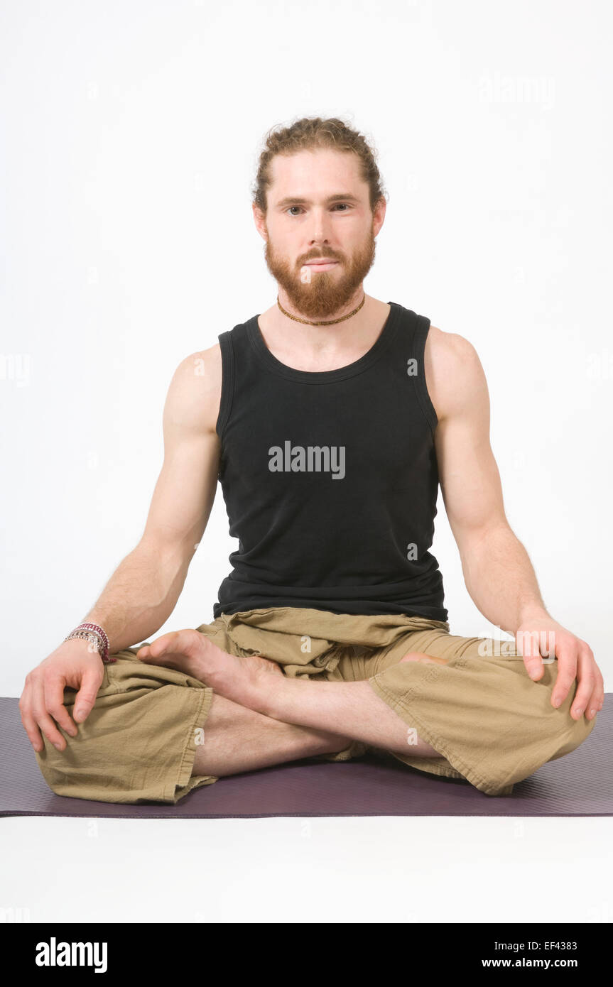 Man doing yoga Stock Photo - Alamy