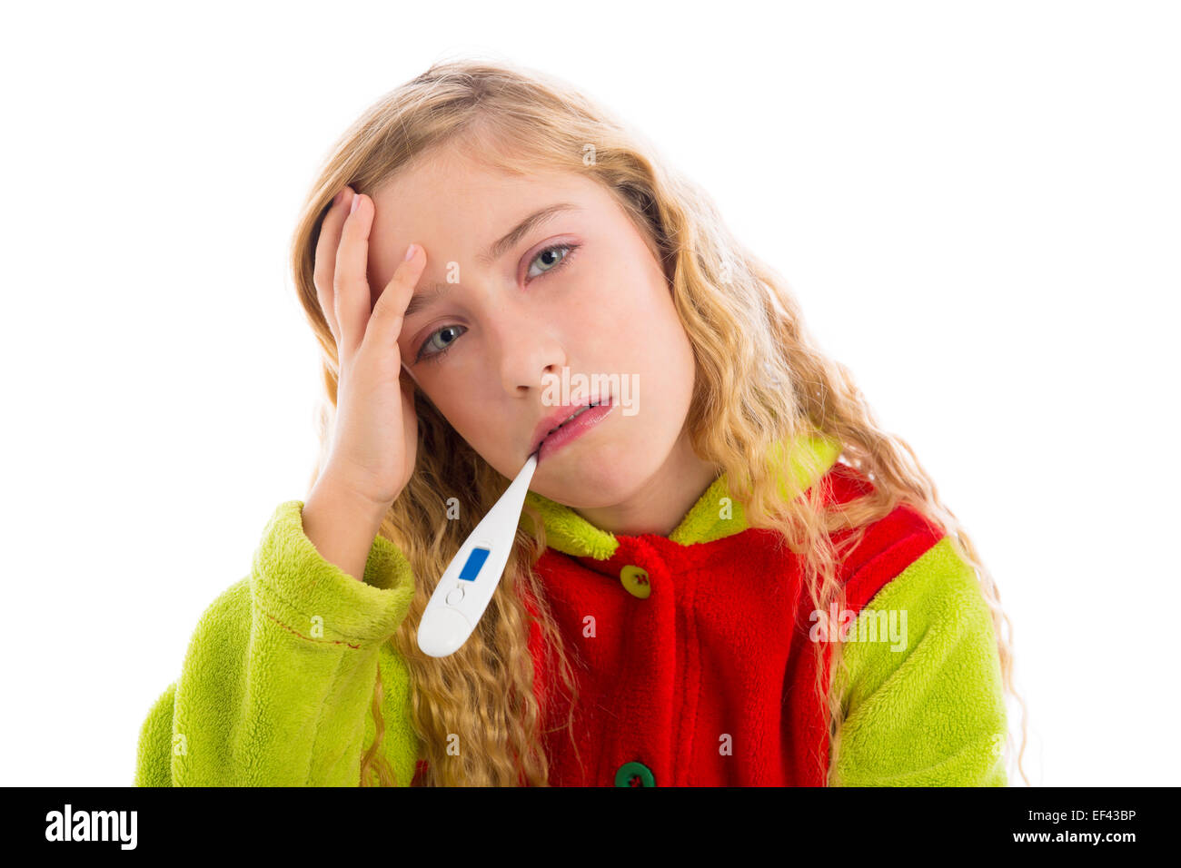 blond girl with thermometer and flu cold in pyjama and sad grumpy face ...