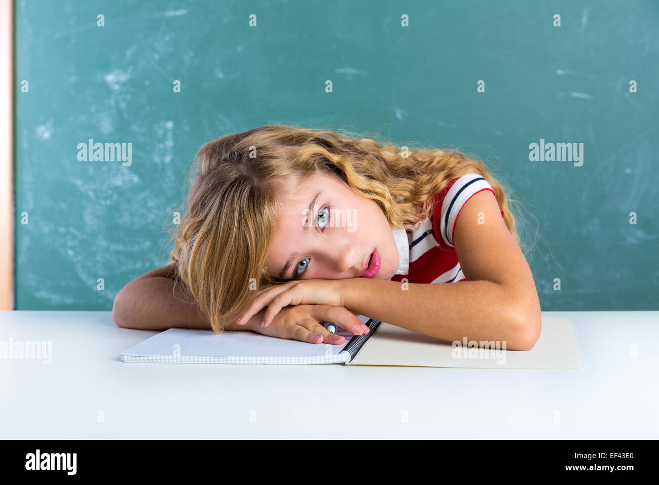 Child writing classroom sad hi-res stock photography and images - Alamy