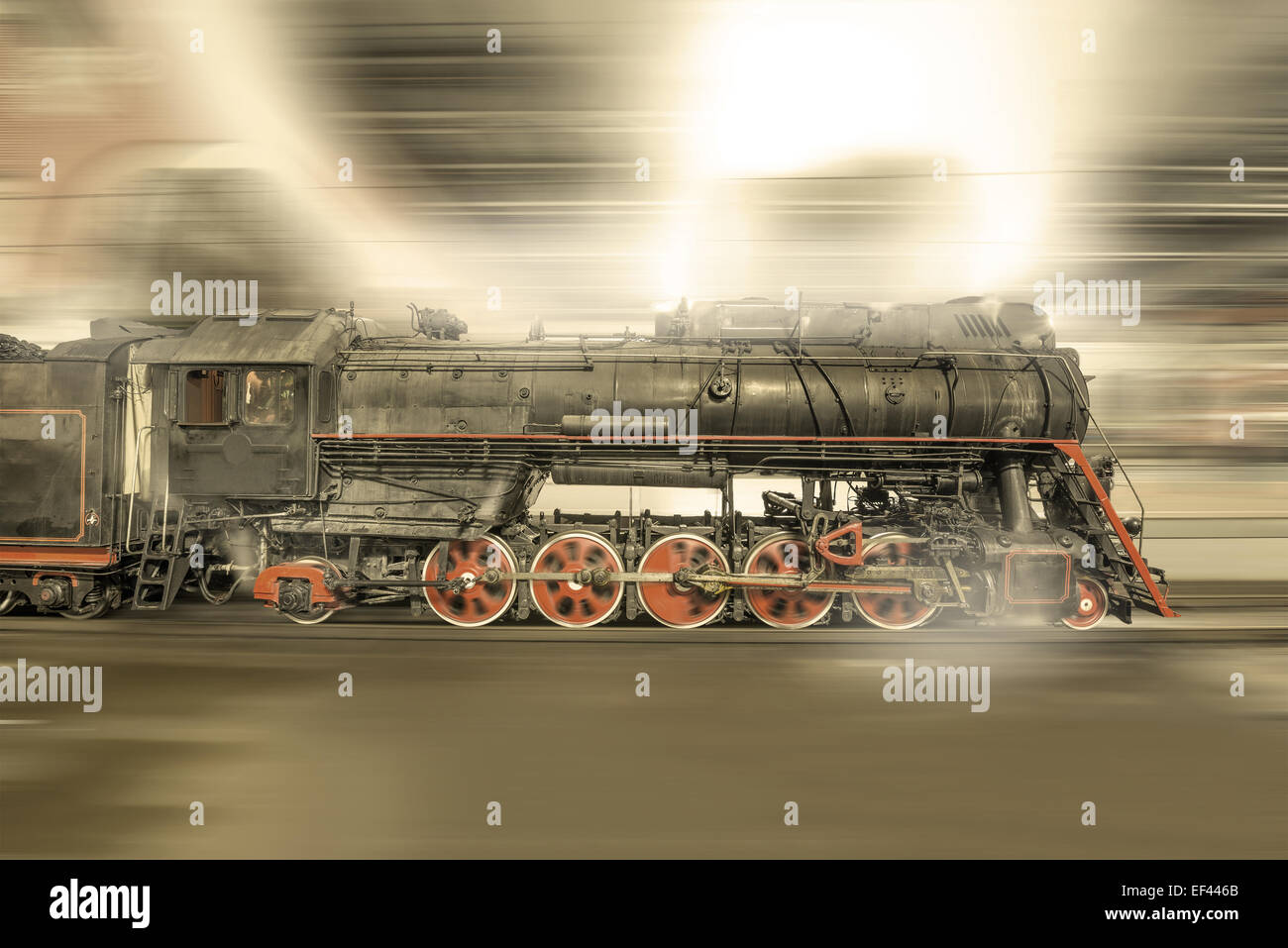 Steam train goes fast on the night station background. Vintage image ...