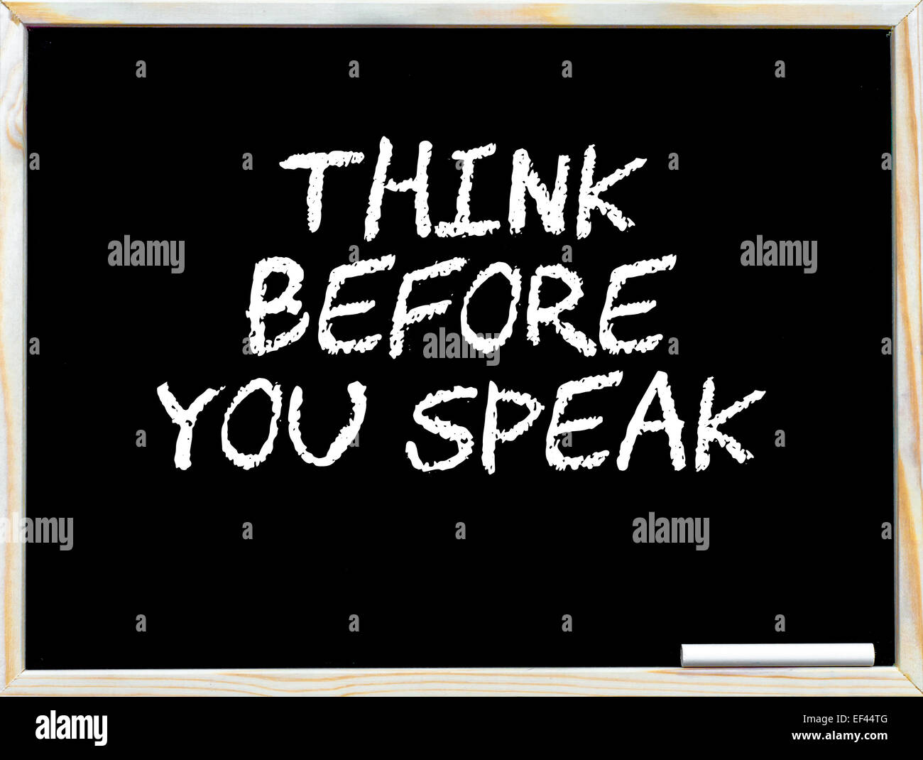 Think before you speak, vintage chalk text on blackboard, white piece ...