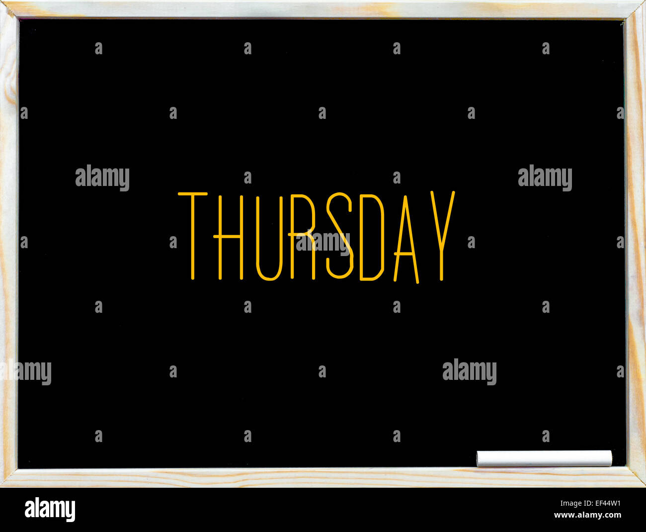 Thursday, vintage chalk text on blackboard, white piece of chalk in the ...