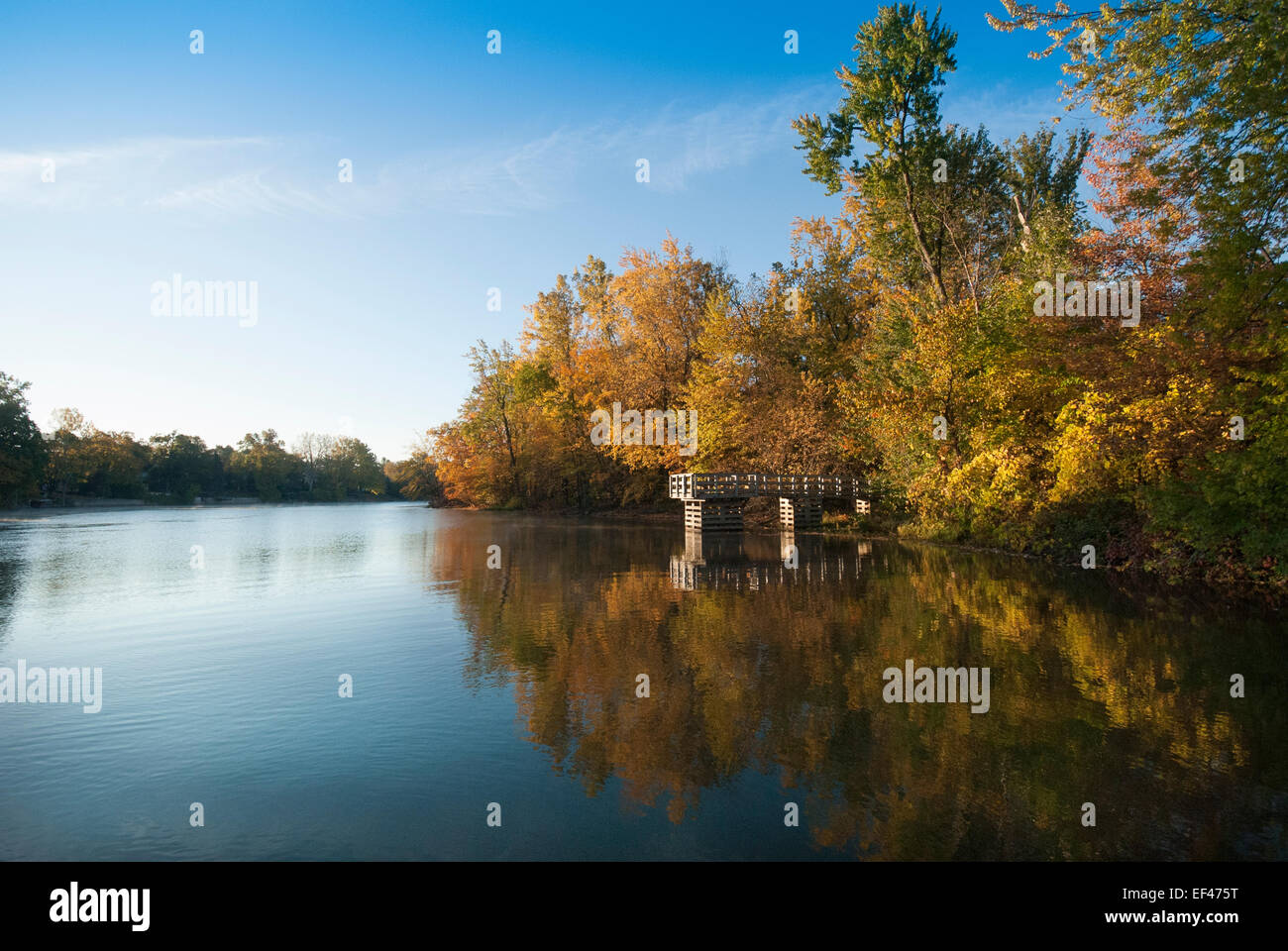 Deck on river in Autumn Stock Photo - Alamy