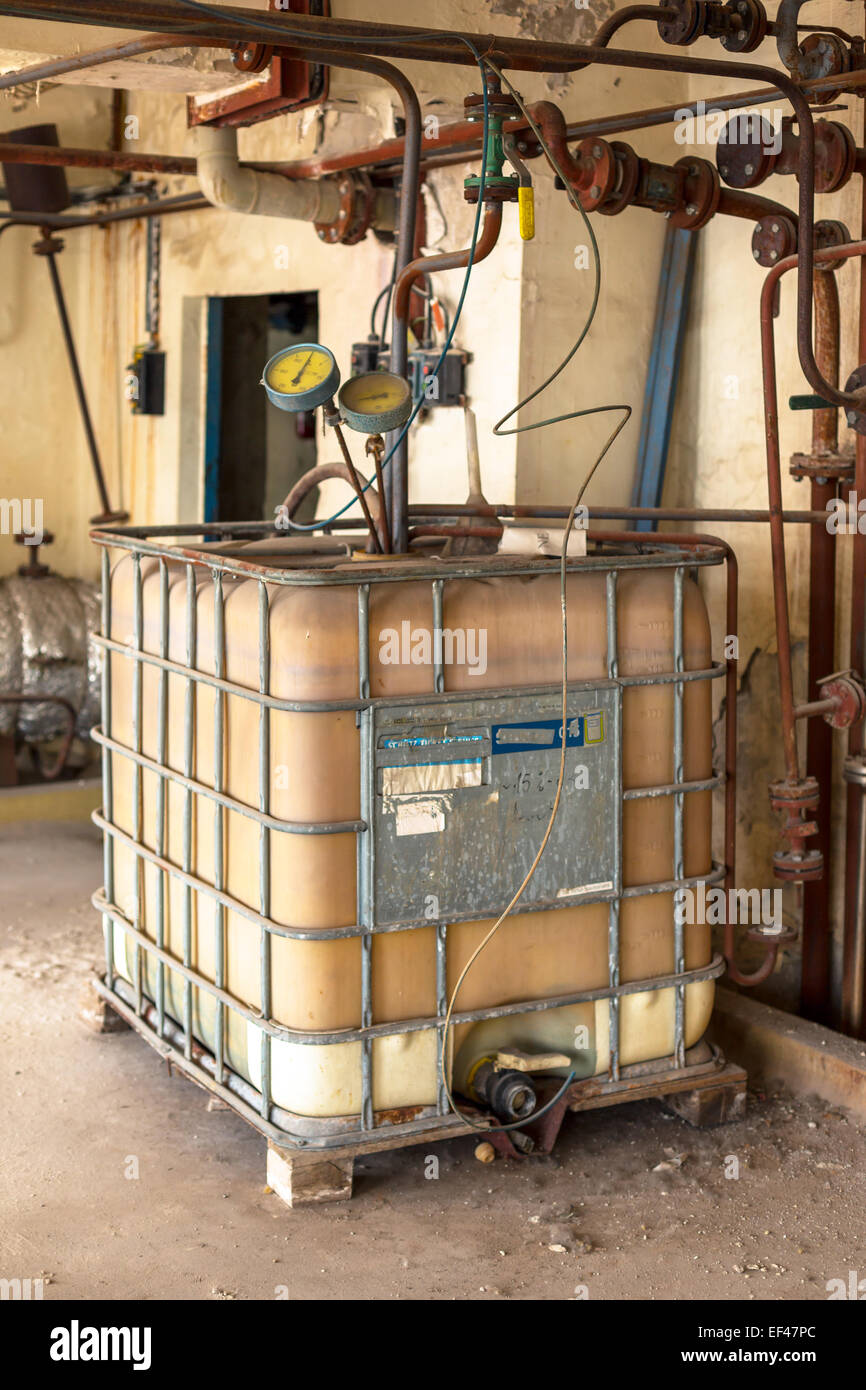 Industrial interior with chemical tanks Stock Photo - Alamy