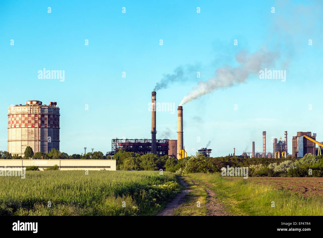 Rural landscape with factory Stock Photo - Alamy