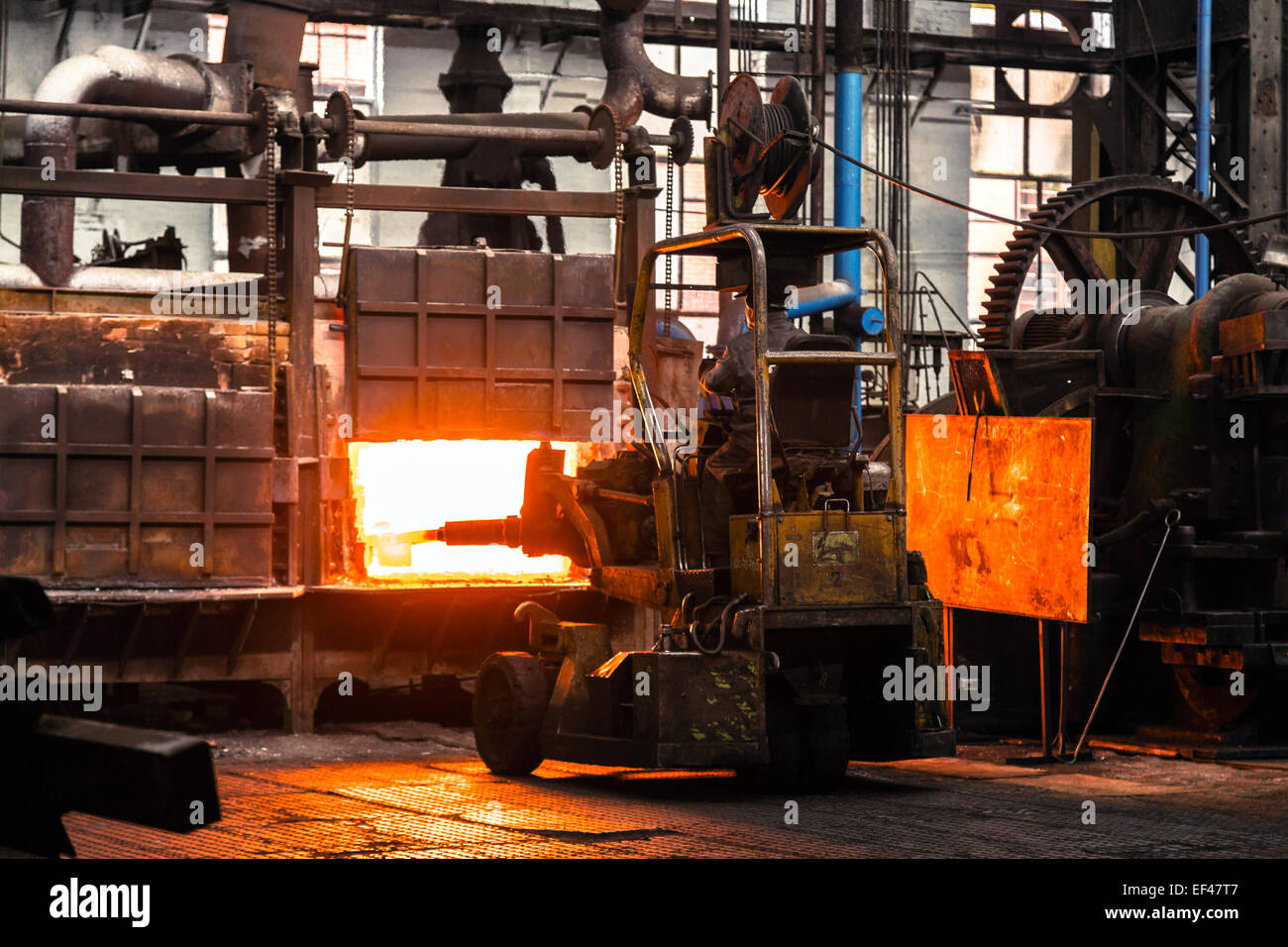 Hard work in a factory Stock Photo - Alamy