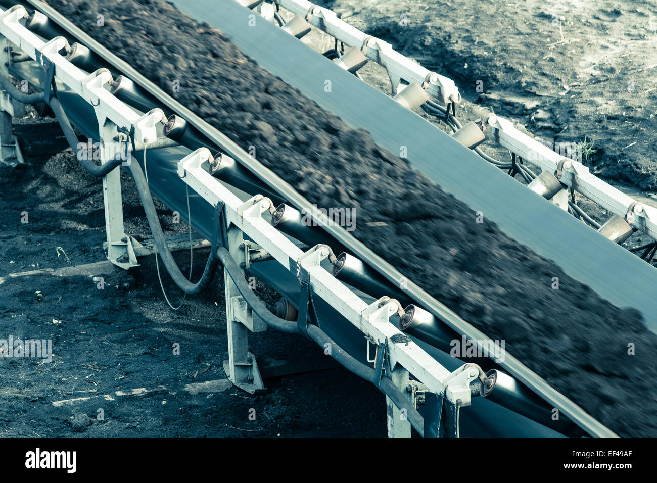 Open pit. Opencast brown coal mine. Belt conveyor as industrial detail ...