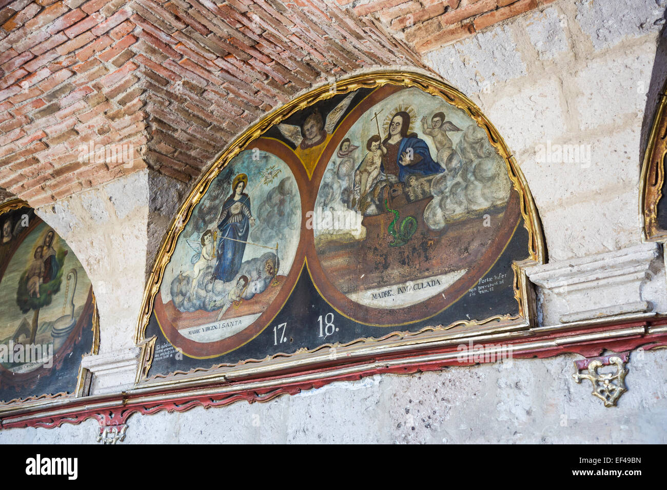 Cloister with ancient religious wall paintings in the iconic Santa ...