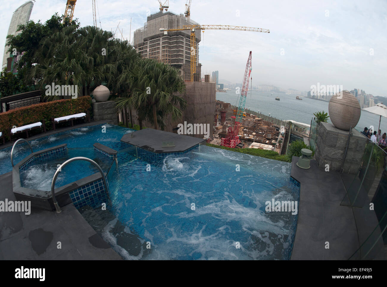 Jacuzzi pool of the Intercontinental Hotel, Tsim Sha Tsui, Kowloon, Hong Kong patrons view of ...