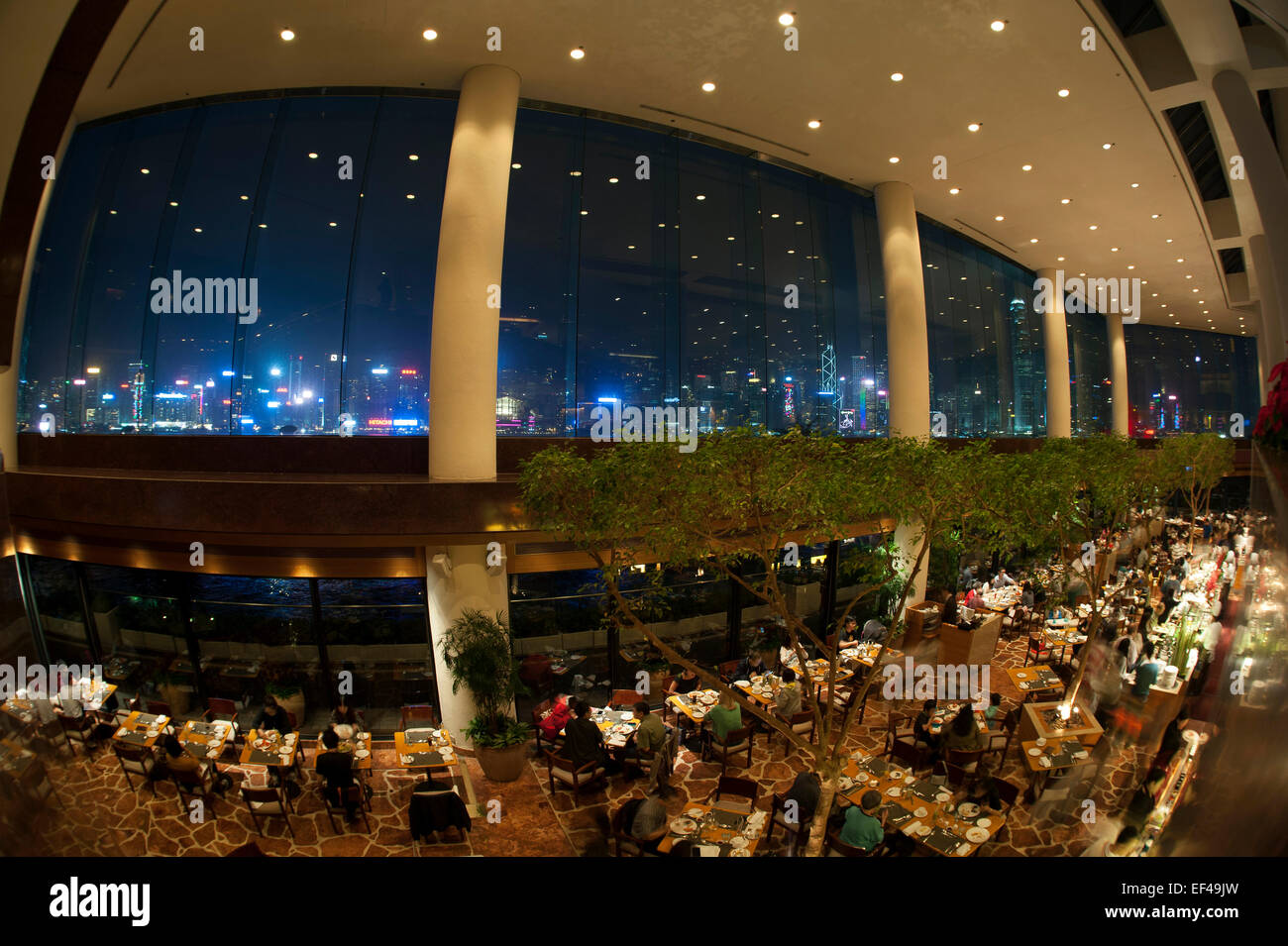 Lobby bar of the Intercontinental Hotel, Tsim Sha Tsui, Kowloon, Hong Kong patrons enjoy the ...